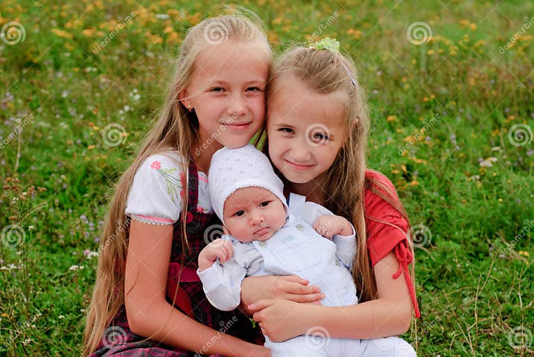 Two sisters and brother stock photo. Image of little - 15729482