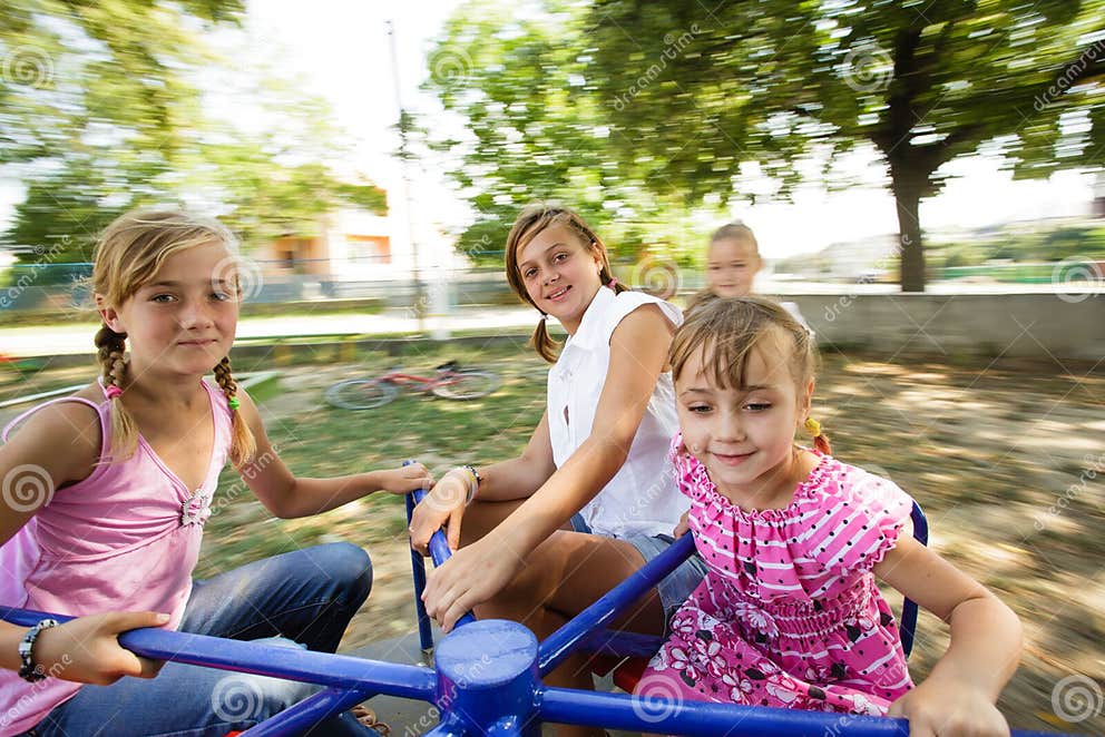 Two Sisters on the Carousel Stock Image - Image of ride, family: 106164695