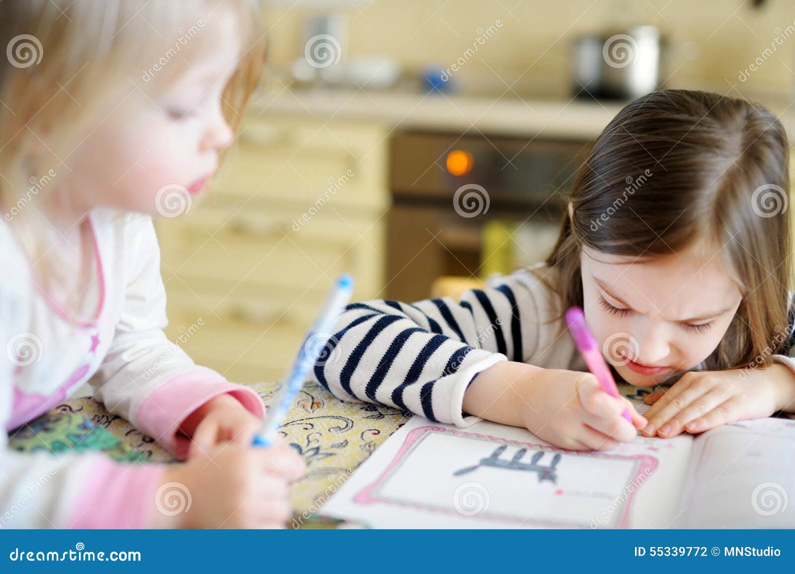 Two Sisters Drawing and Learning Together Stock Photo - Image of ...