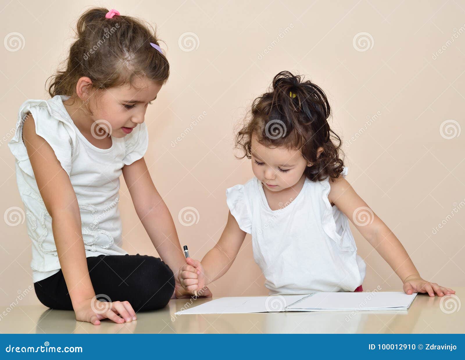 Two Sisters Drawing and Playing Stock Photo - Image of children, family ...