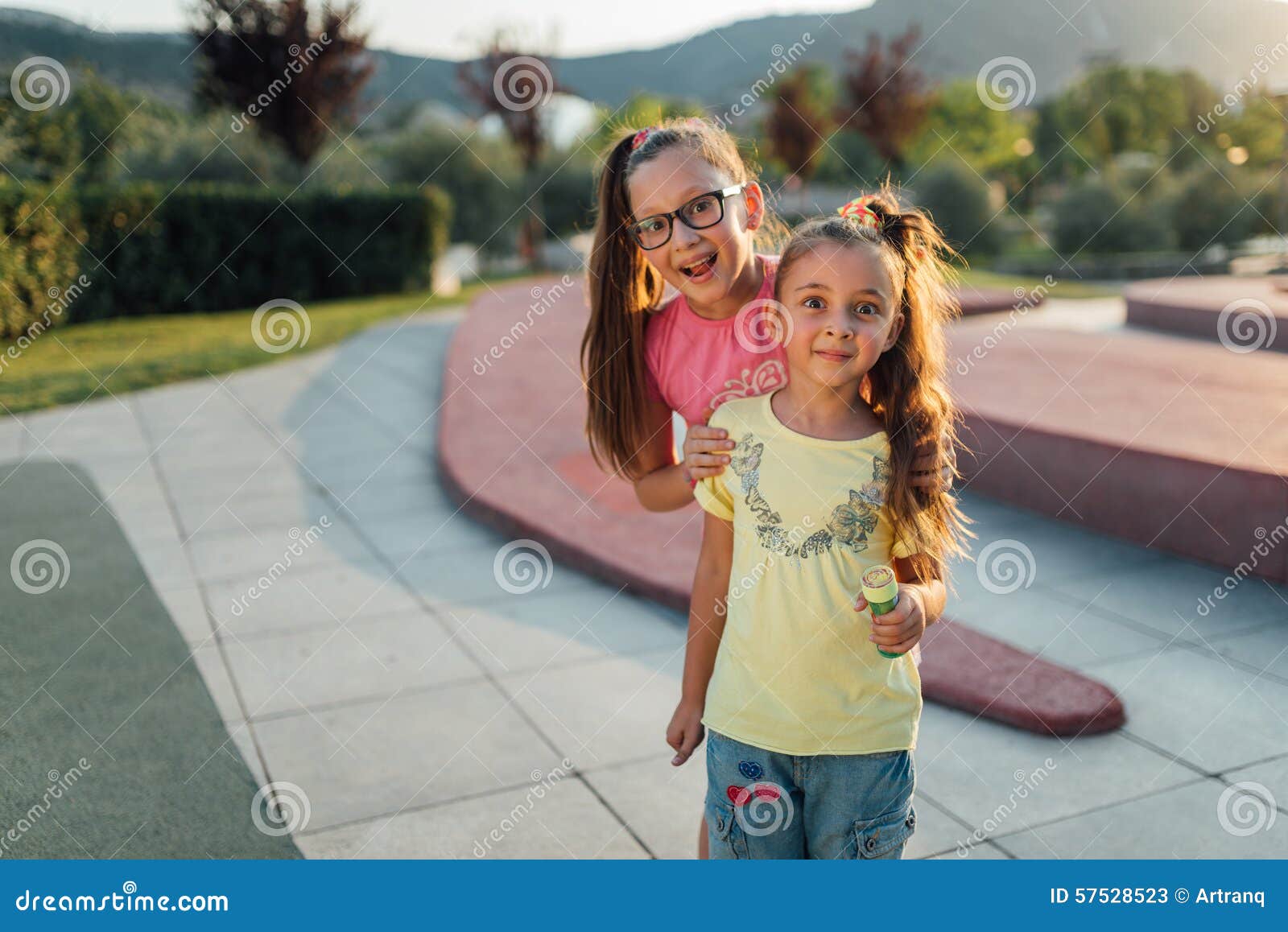 Two Sisters are Happy in the Park Stock Image - Image of cheerful, park ...