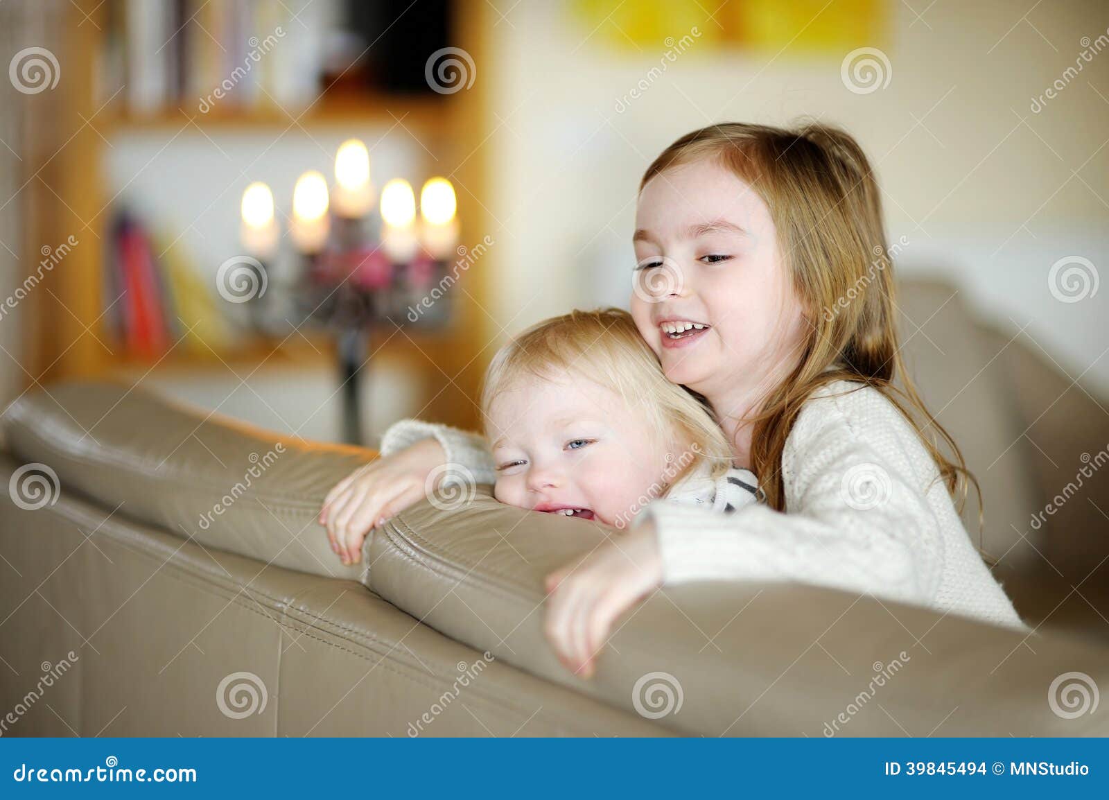 TwÐ¾ Sisters Having Fun at Home Stock Photo - Image of expression, sofa ...