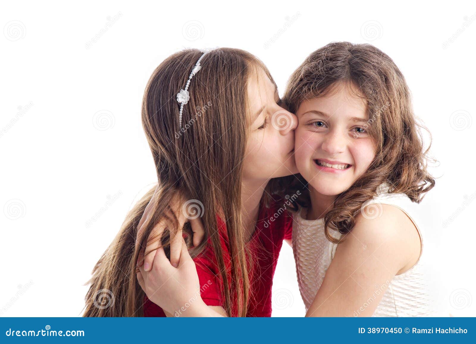 Two Sisters Kissing And Hugging Stock Photo | CartoonDealer.com #38970450