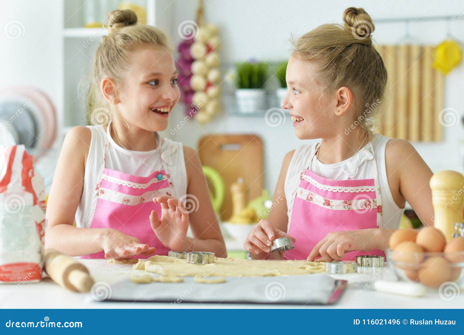 Two sisters in the kitchen stock photo. Image of recipe - 116021496