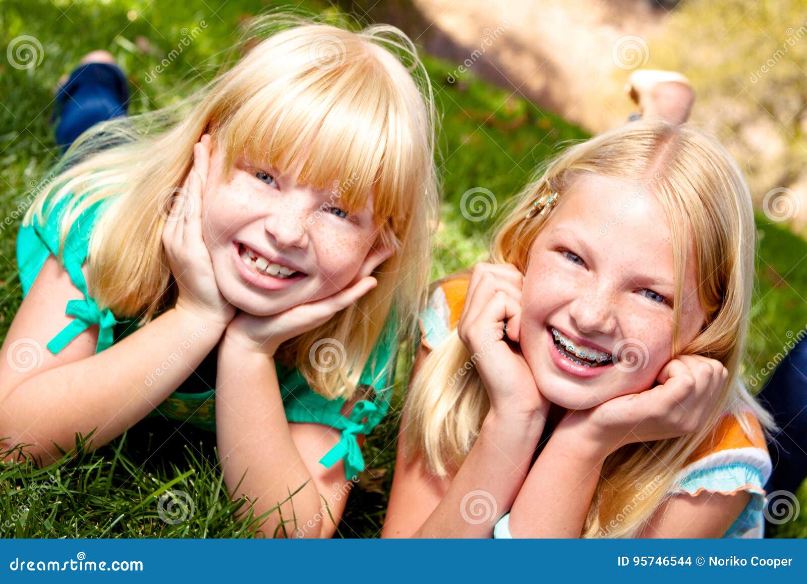 Two Sisters Laughing and Having Fun. Stock Photo - Image of outdoors ...
