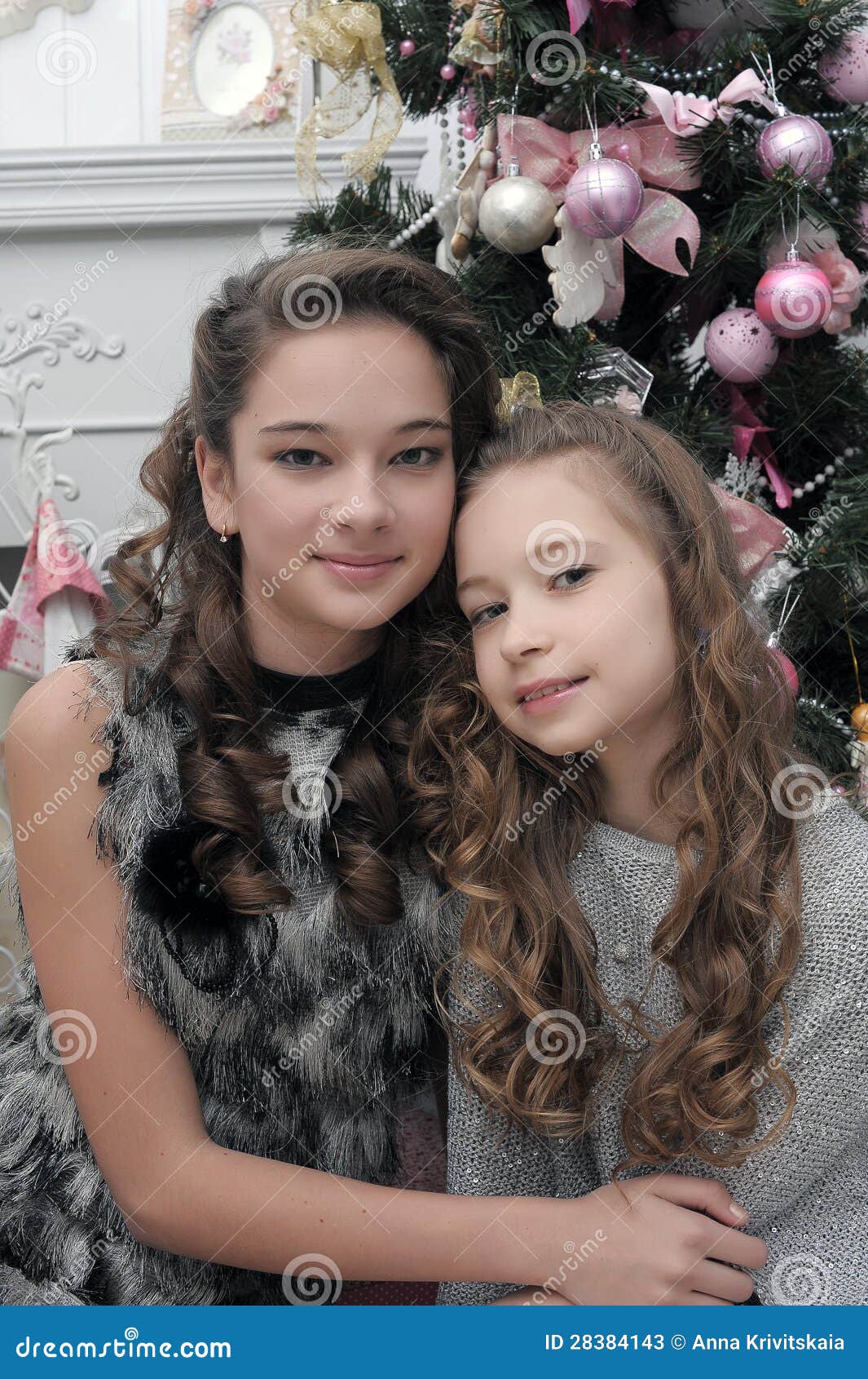 Two Sisters Near a Christmas Tree Stock Image - Image of christmas ...