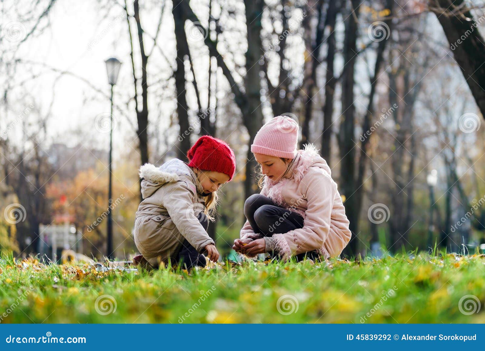 Two Sisters Playing in Autumnal Park Stock Photo - Image of park ...
