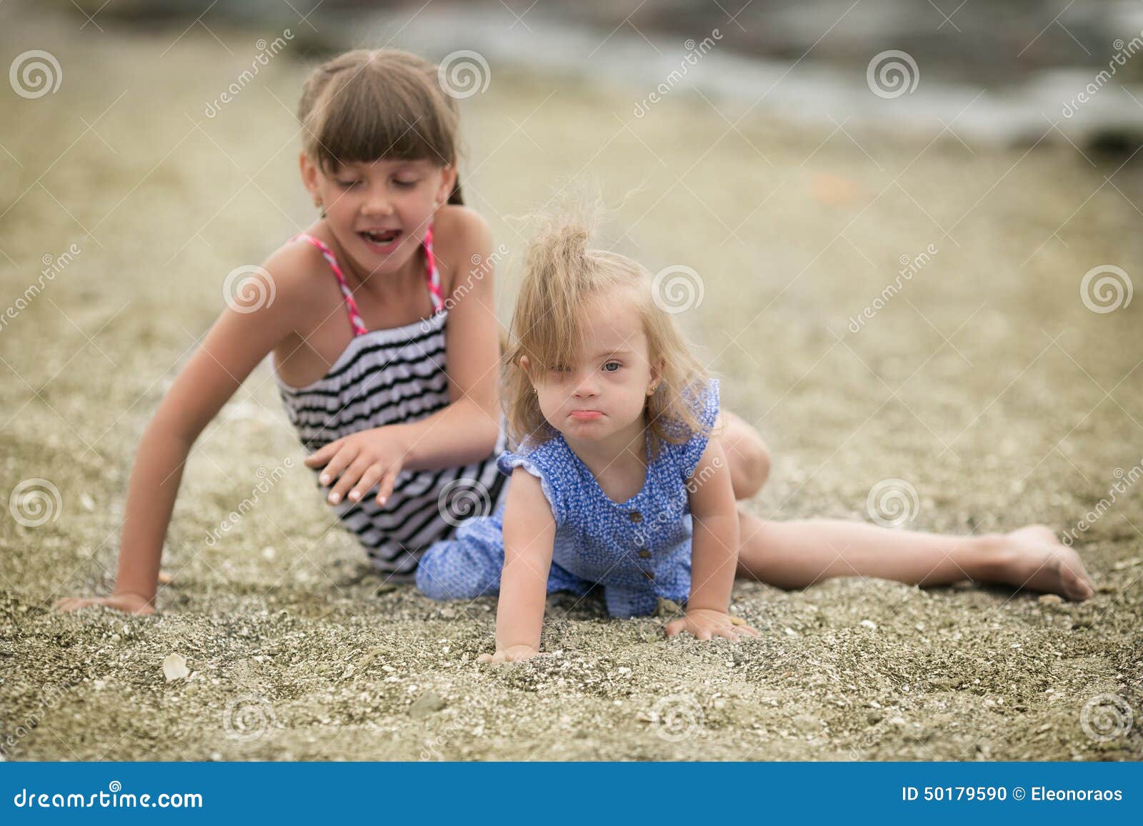Two Sisters Playing on the Beach Stock Photo - Image of beautiful, blue ...