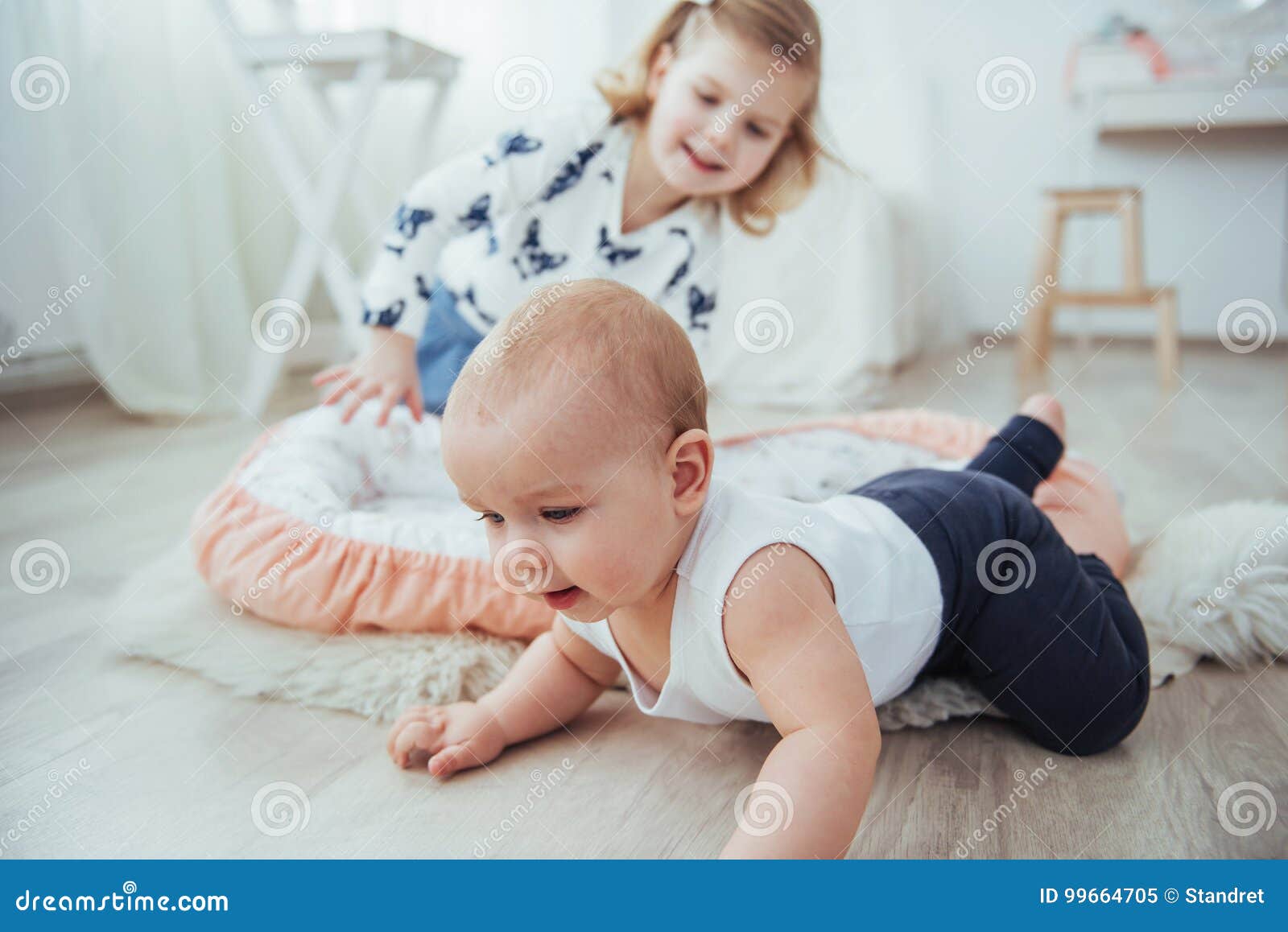 Two Sisters Playing in a Beautiful Bright Room Stock Image - Image of ...