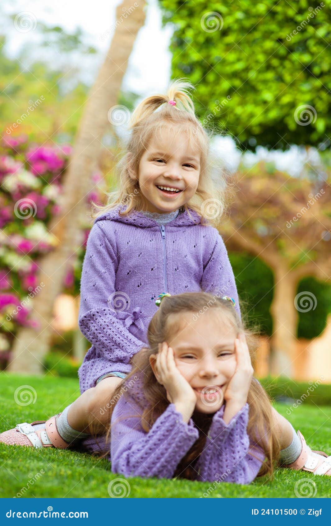 Two Sisters Playing on Green Meadow Stock Photo - Image of child, baby ...