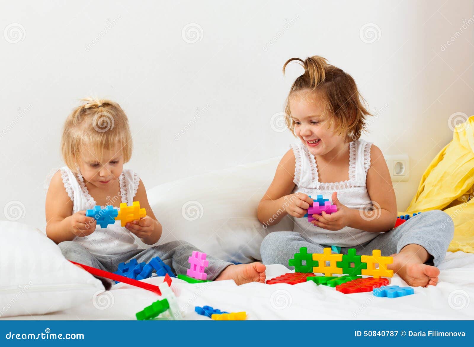 Two sisters playing stock image. Image of happy, girl - 50840787