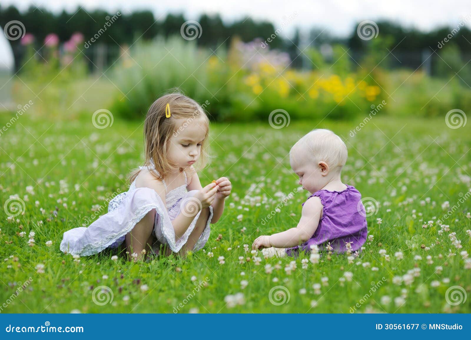 Two Sisters Playing Outside Stock Image - Image of purple, nice: 30561677
