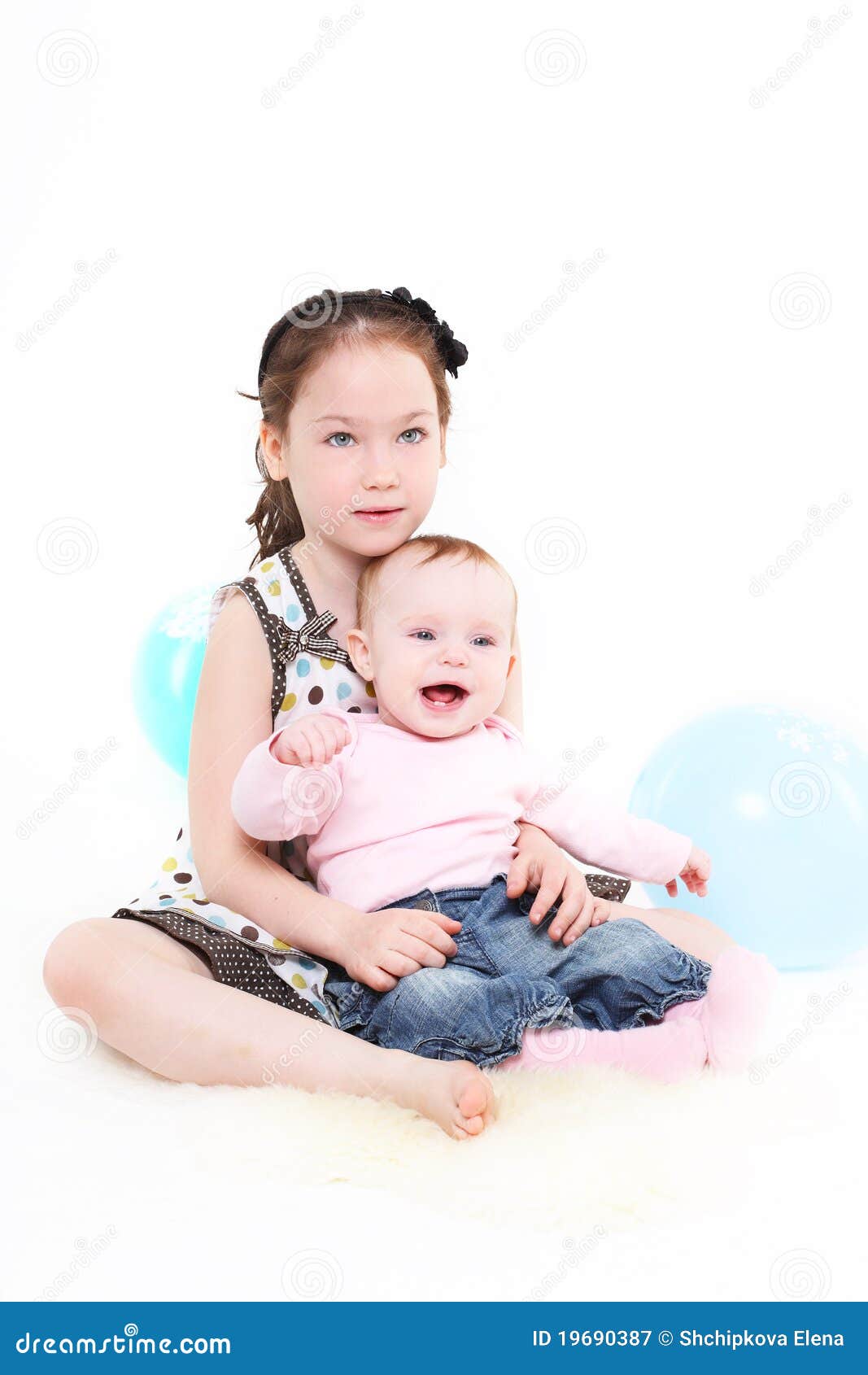 Two sisters sit together. stock image. Image of daughter - 19690387