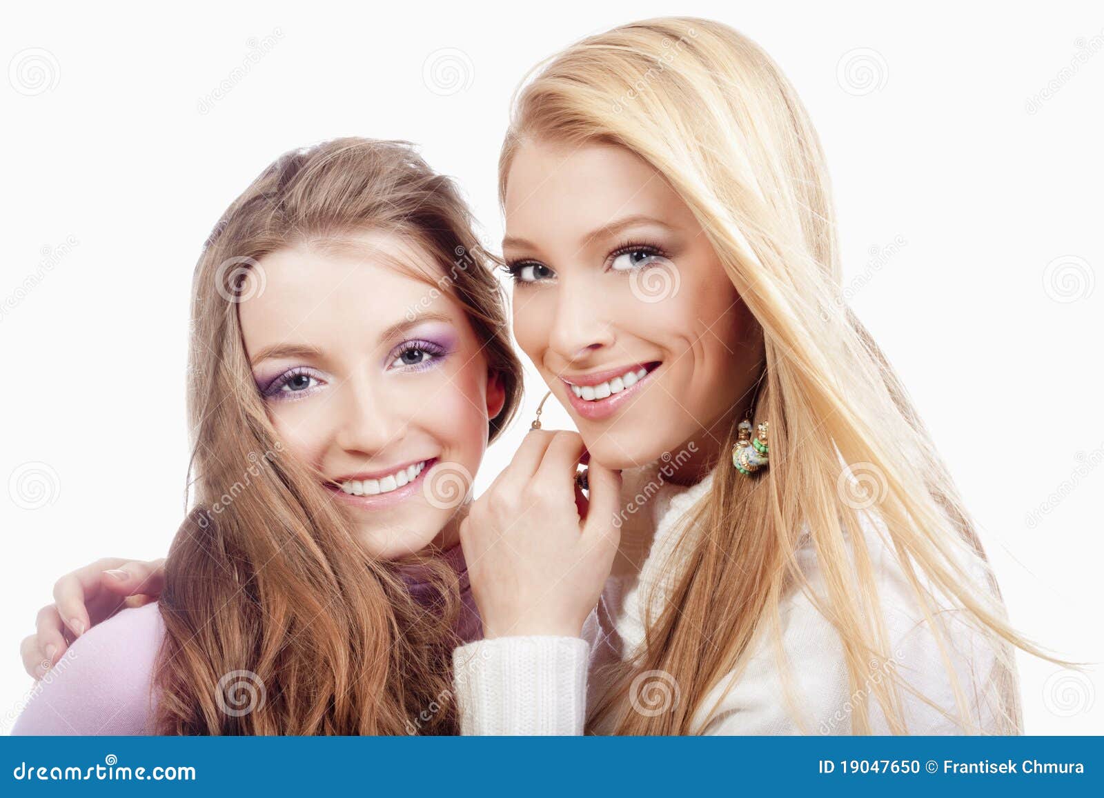 Two sisters smiling stock photo. Image of embracing, smiling - 19047650