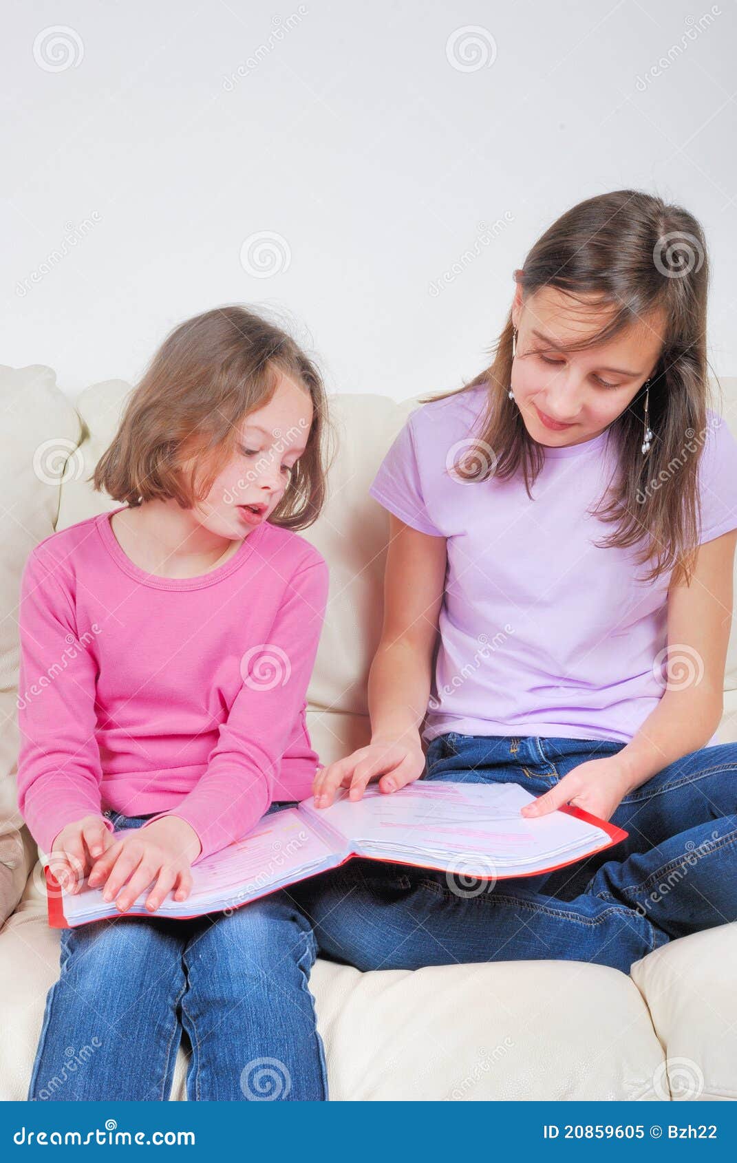 Two Sisters Student on the Couch Stock Image - Image of sofa, notebook ...