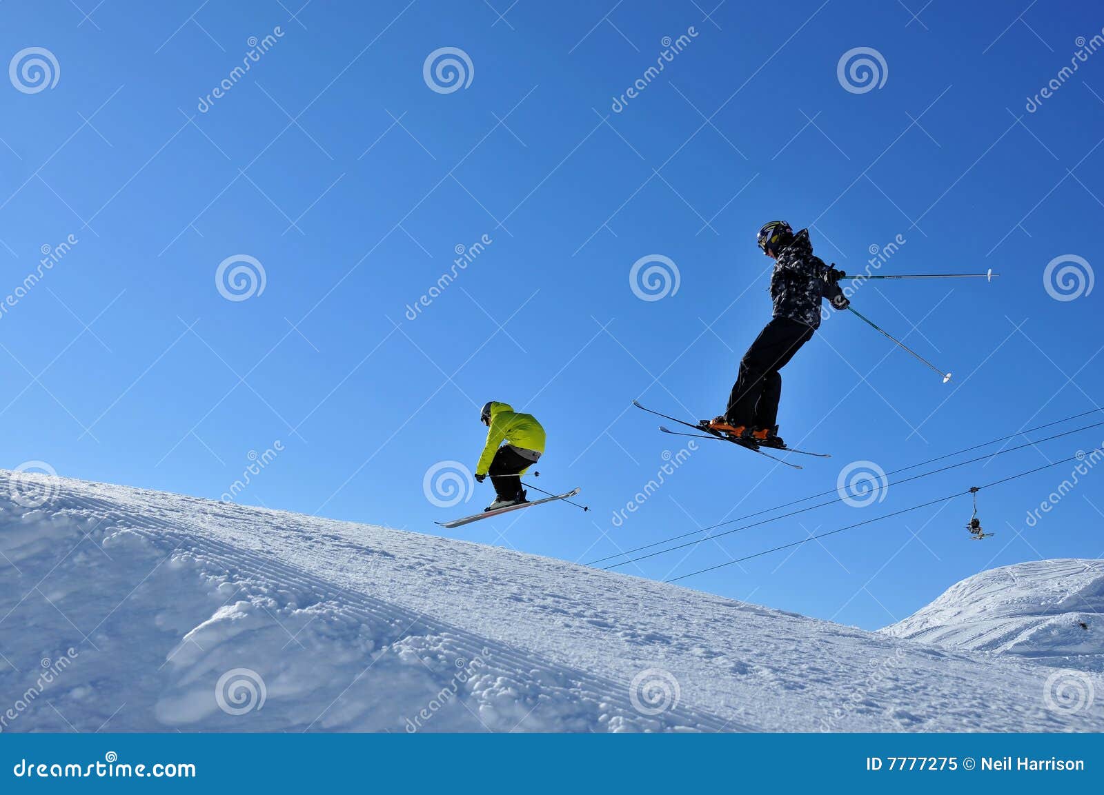 Two Skiers Jumping Together Stock Image - Image of dangerous, jump: 7777275