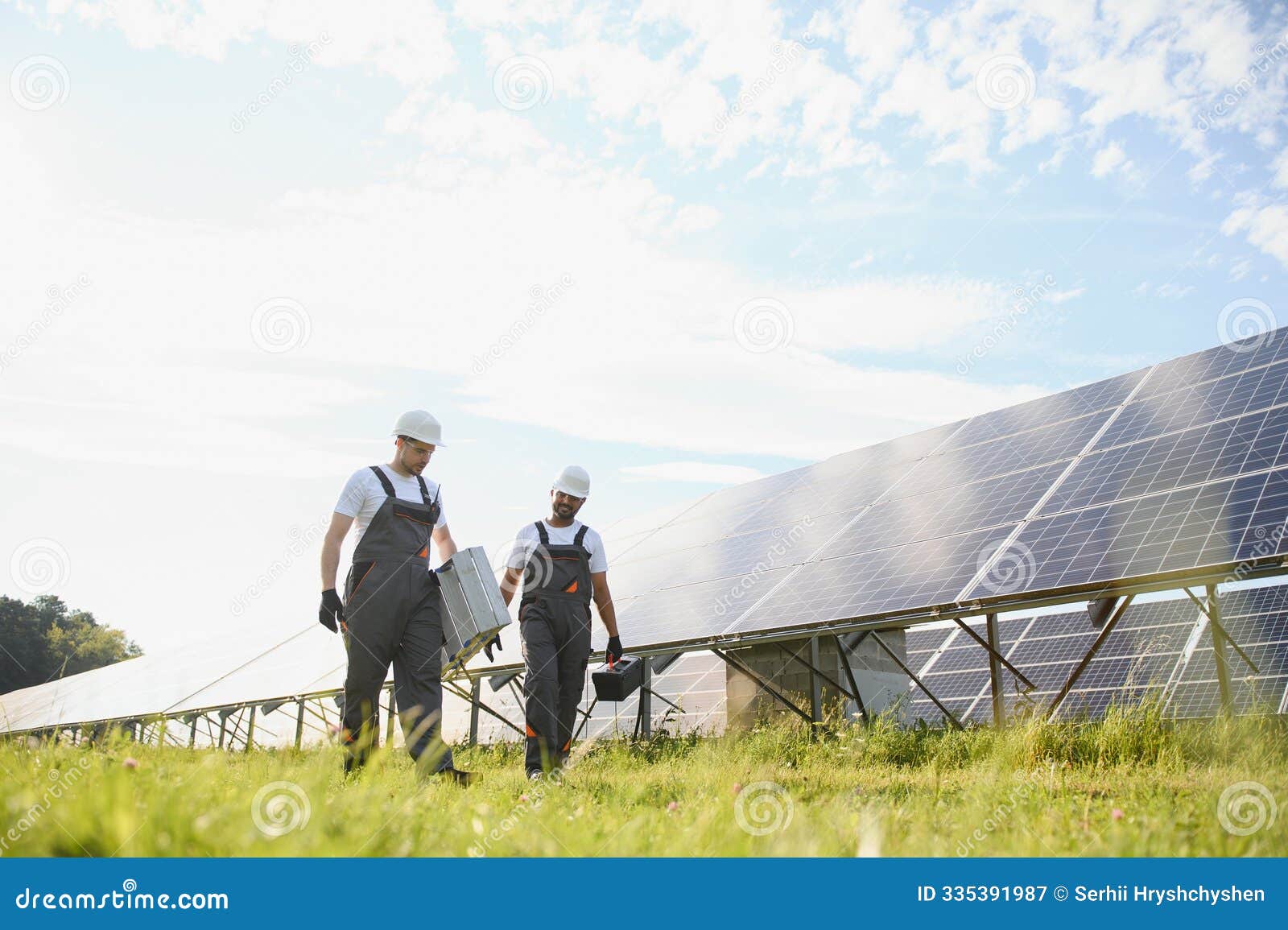 Two Skilled Workers or Craftsmen Wearing Working Gray Uniforms ...