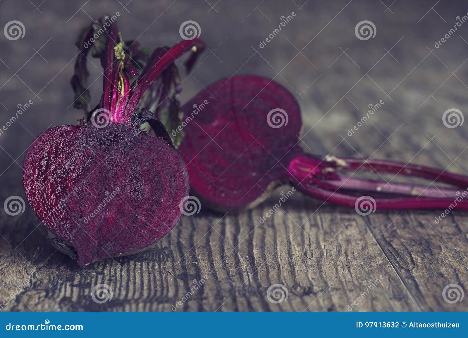 Two Sliced Beetroot on a Brown Wooden Table in Artistic Conversion ...