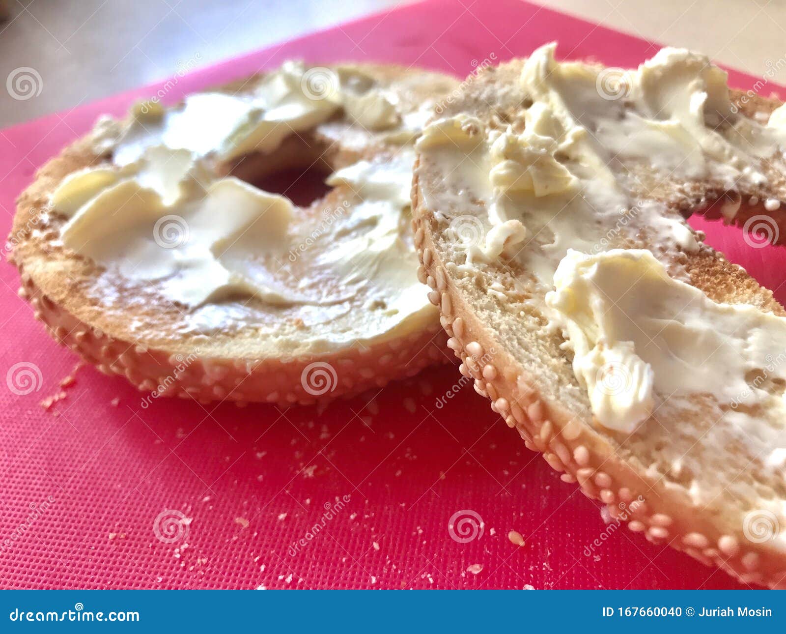 Two slices of bagel with stock photo. Image of cheese - 167660040