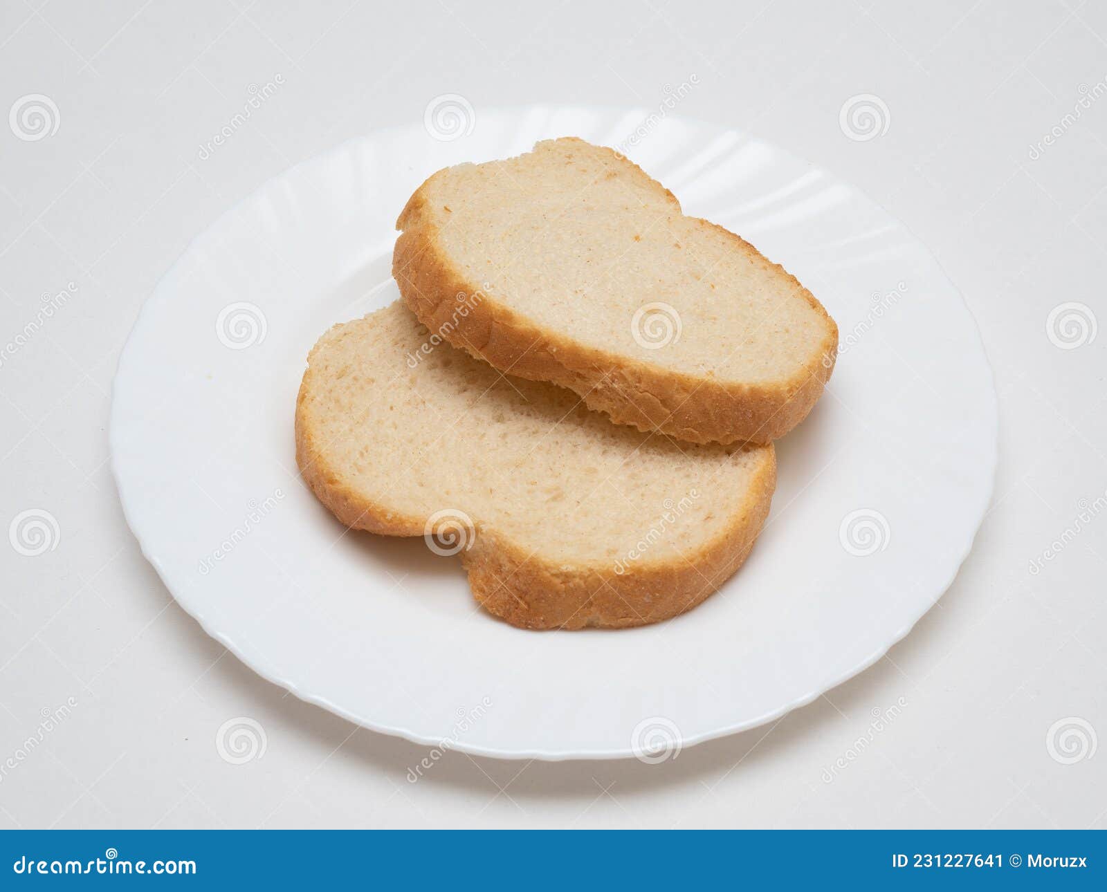 Two Slices of Bread on a White Dish Stock Image - Image of diet, dinner ...