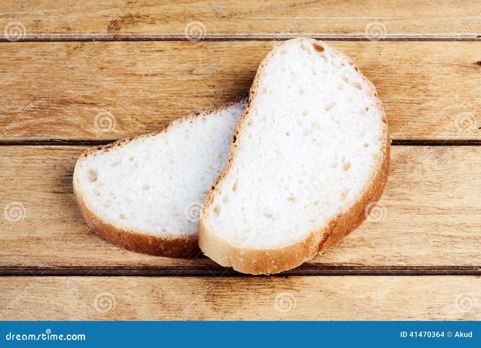Two slices of bread stock photo. Image of closeup, wooden - 41470364