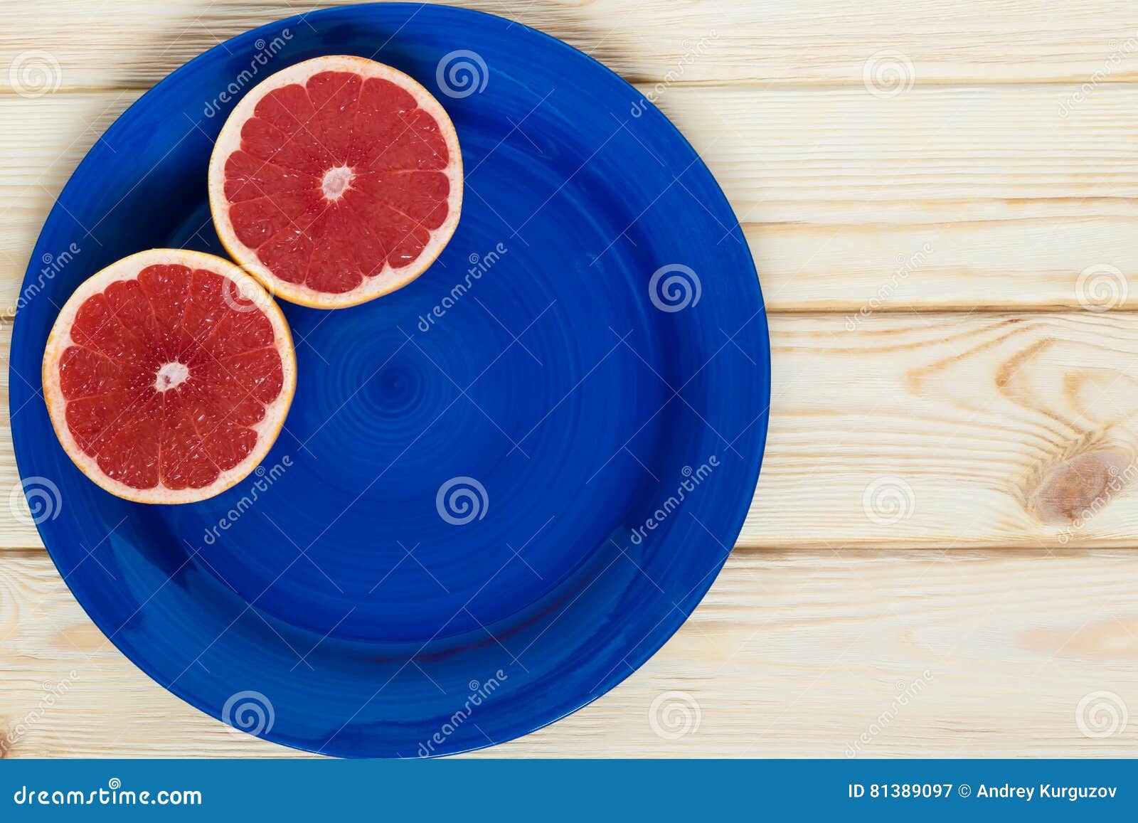 Two Slices of Red Grapefruit on a Plate Stock Image - Image of meal ...