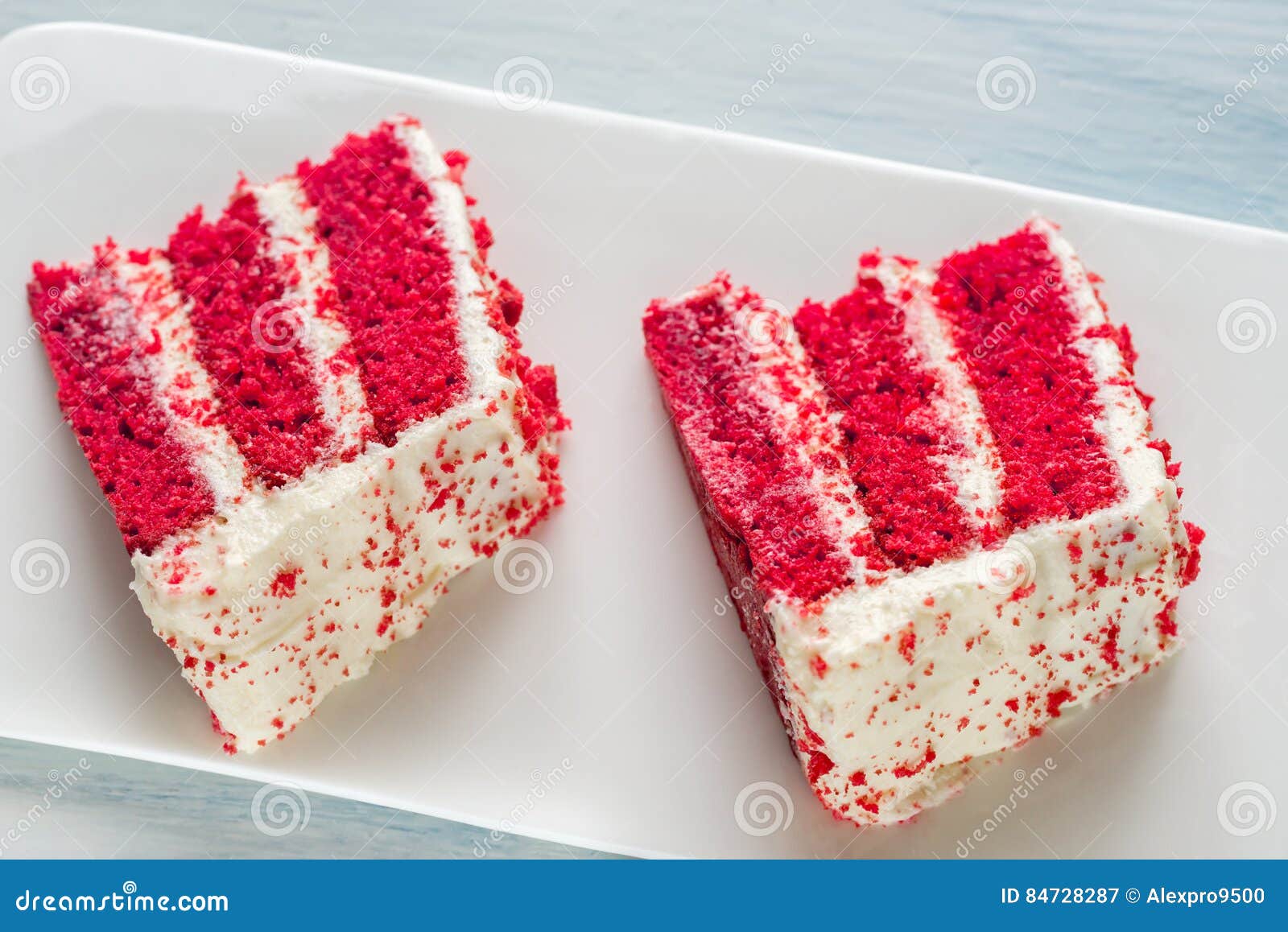 Two Slices of Red Velvet Cake on the White Plate Stock Image - Image of ...