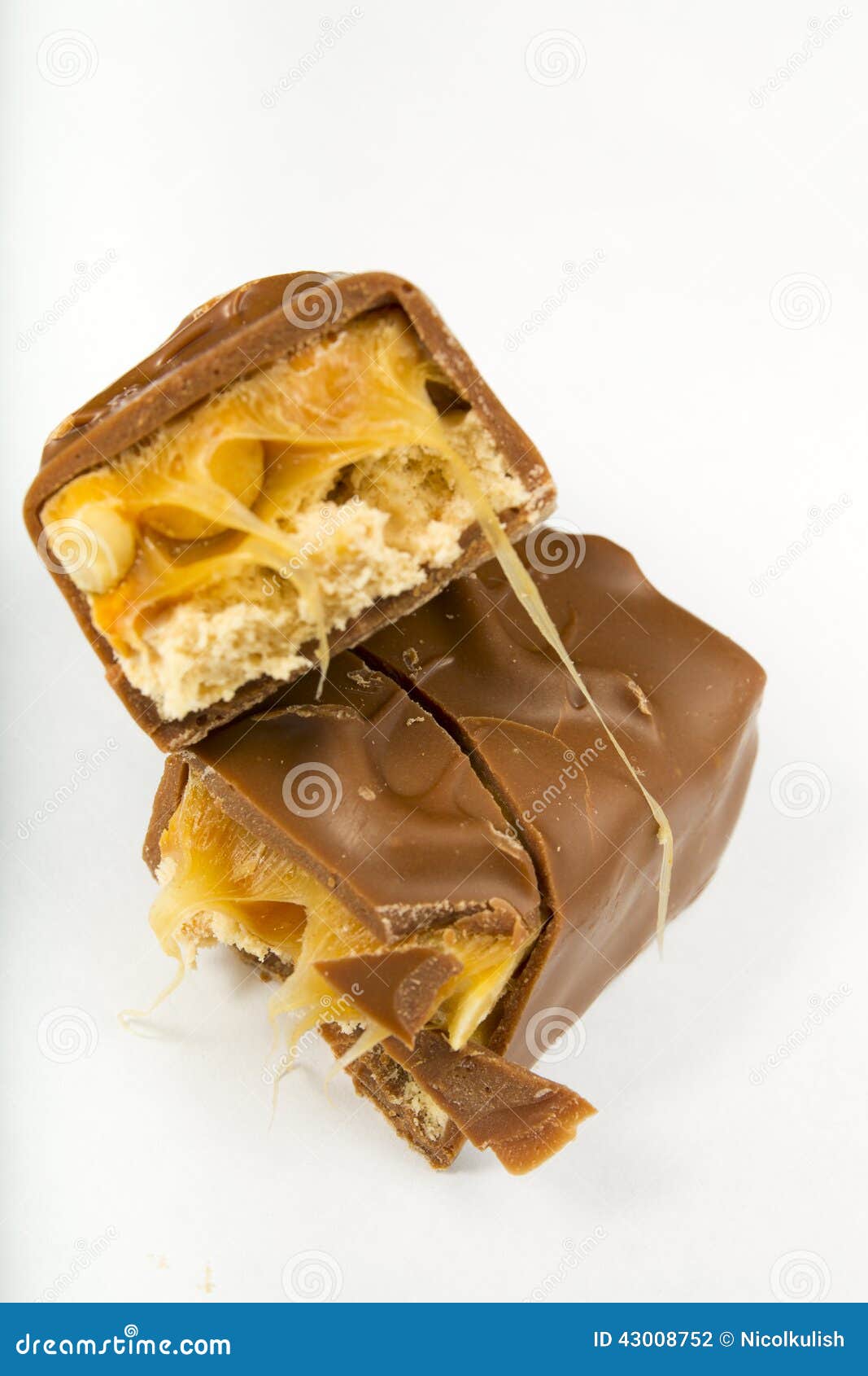 Two Slices of Snickers Bars on a White Macro Stock Photo - Image of ...