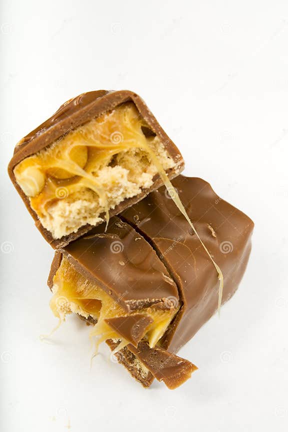 Two Slices of Snickers Bars on a White Macro Stock Photo - Image of ...