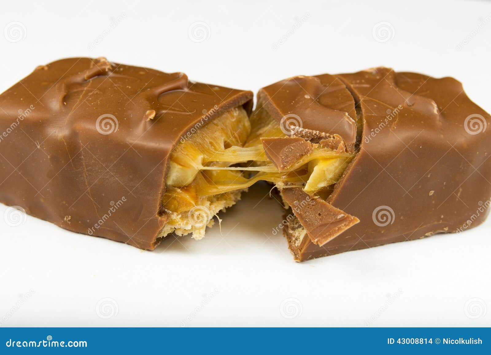 Two Slices of Snickers Bars on a White Macro Stock Photo - Image of ...