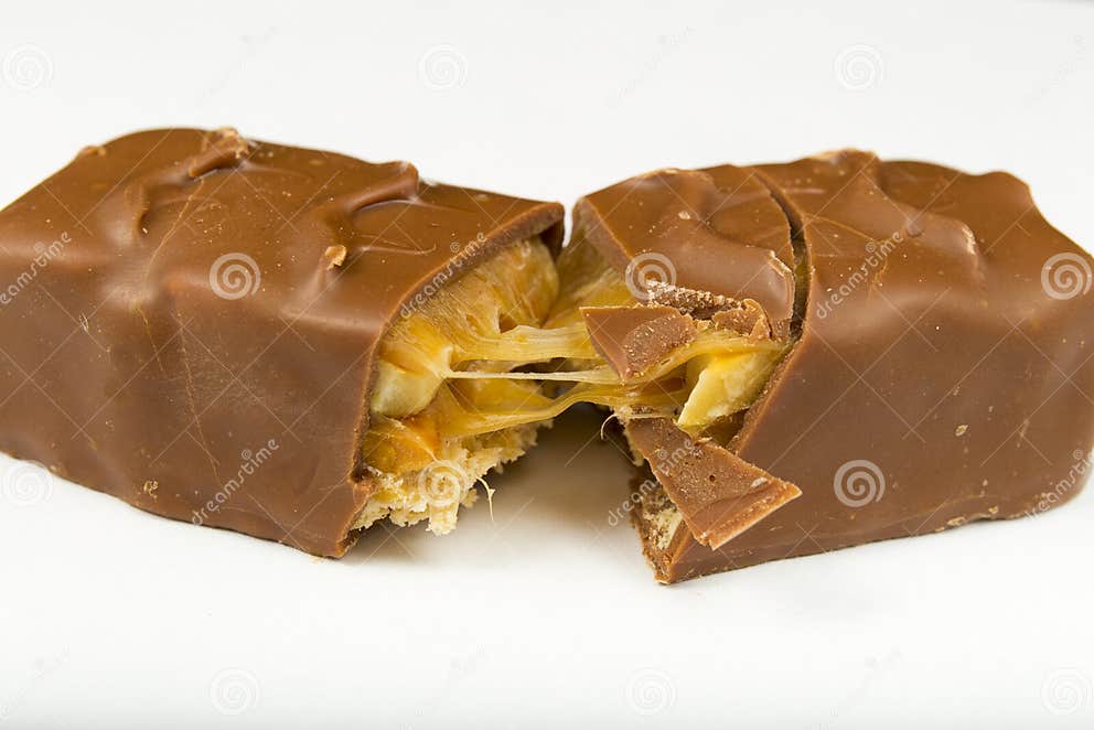 Two Slices of Snickers Bars on a White Macro Stock Photo - Image of ...