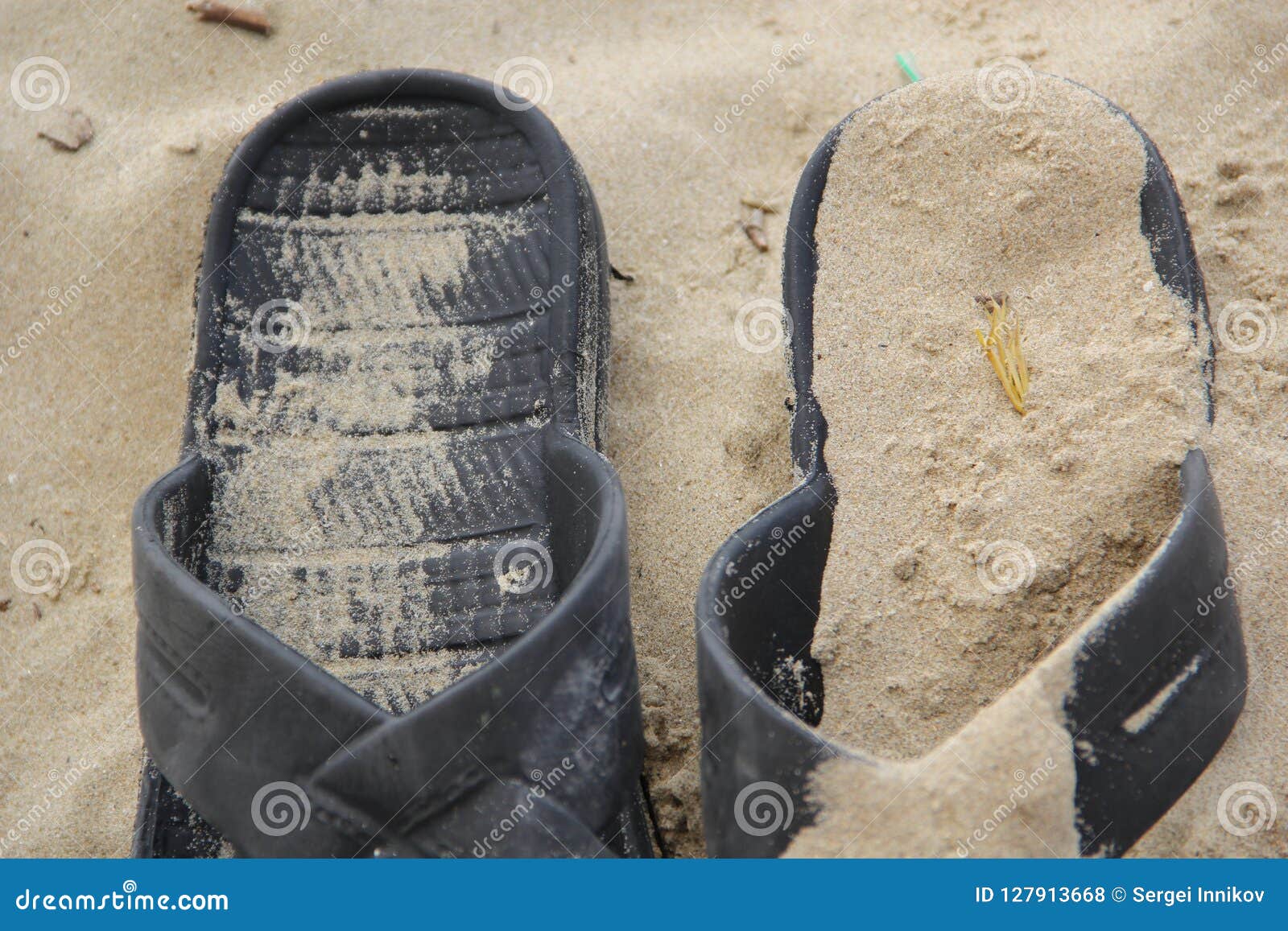 Two Slippers in the Sand Half in the Frame Stock Photo - Image of ...