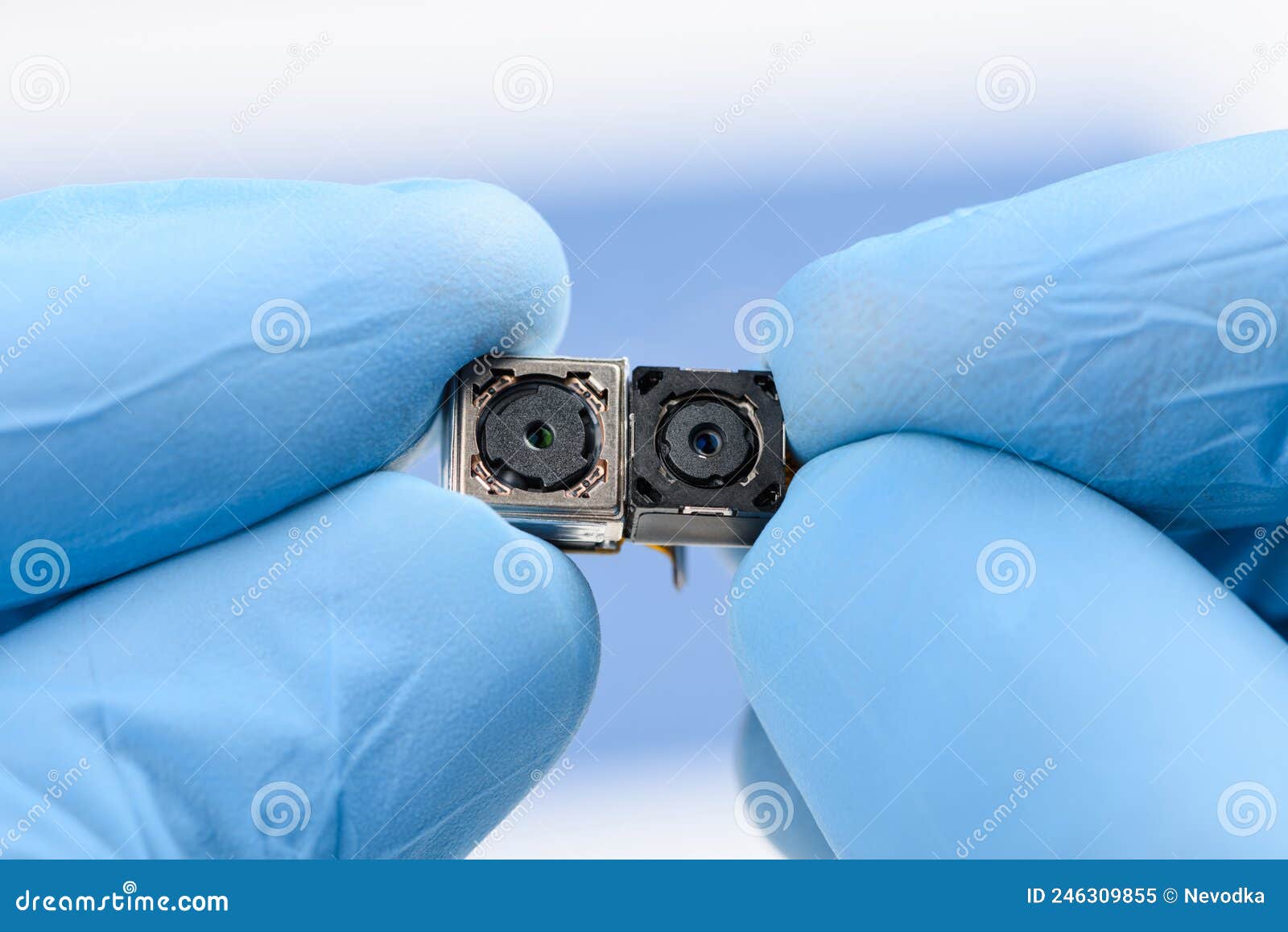 Two Small Camera Modules in Scientist Hands. Smartphone Sensor ...
