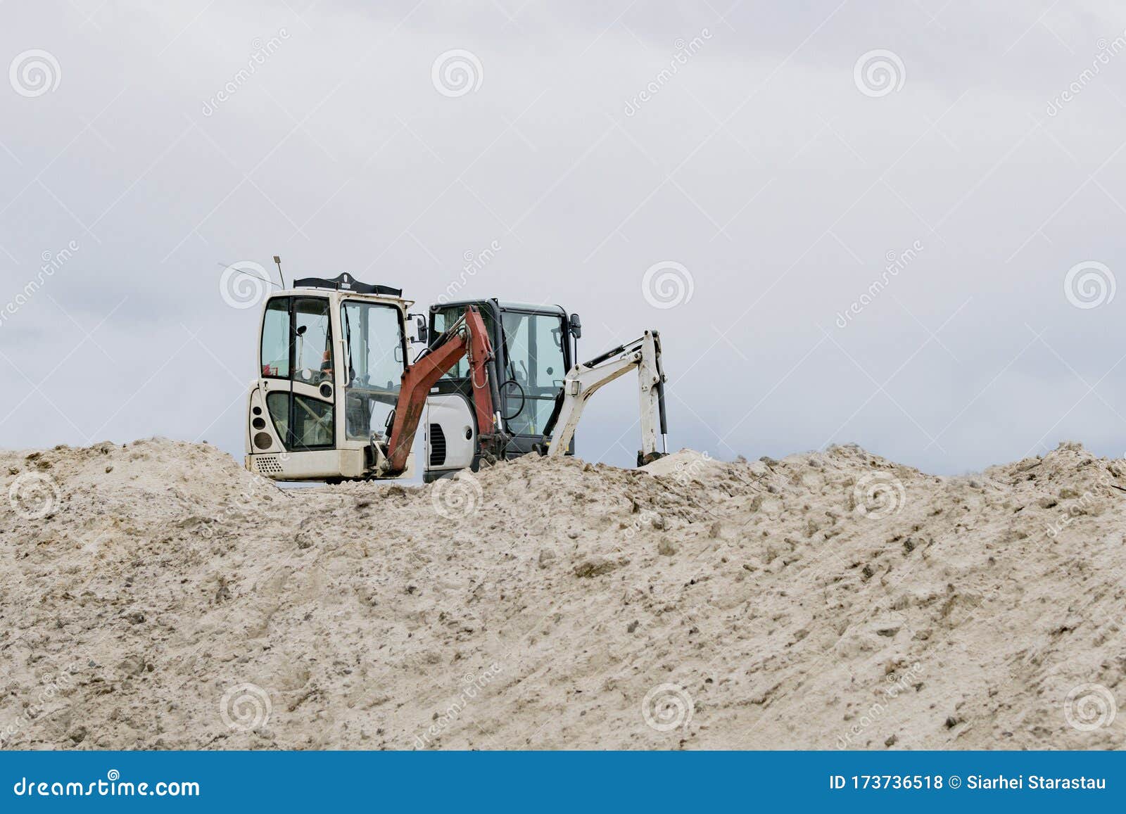 Two small crawler tractors stock photo. Image of excavator - 173736518