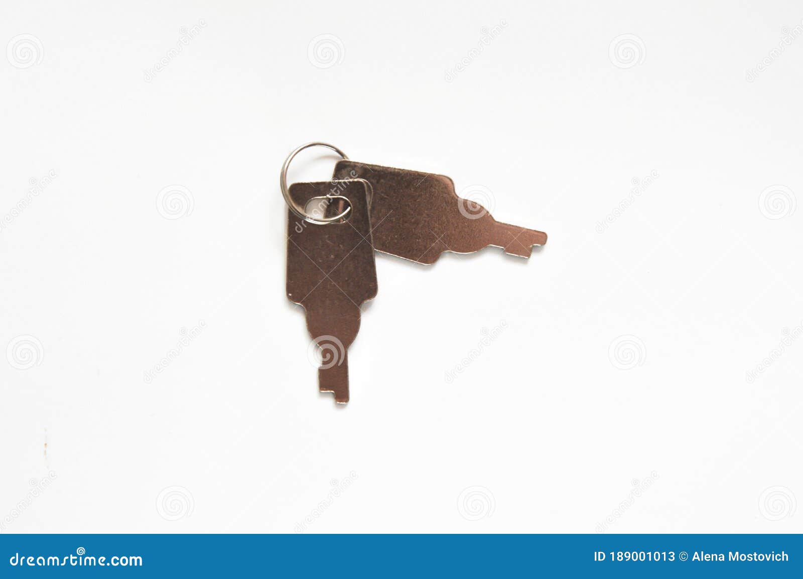 Two Small Keys To the Lock on a White Background. Stock Image - Image ...