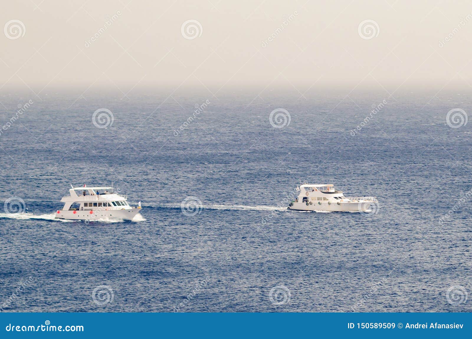 Two Small Pleasure Craft Sailing in the Morning Sea Stock Image - Image ...