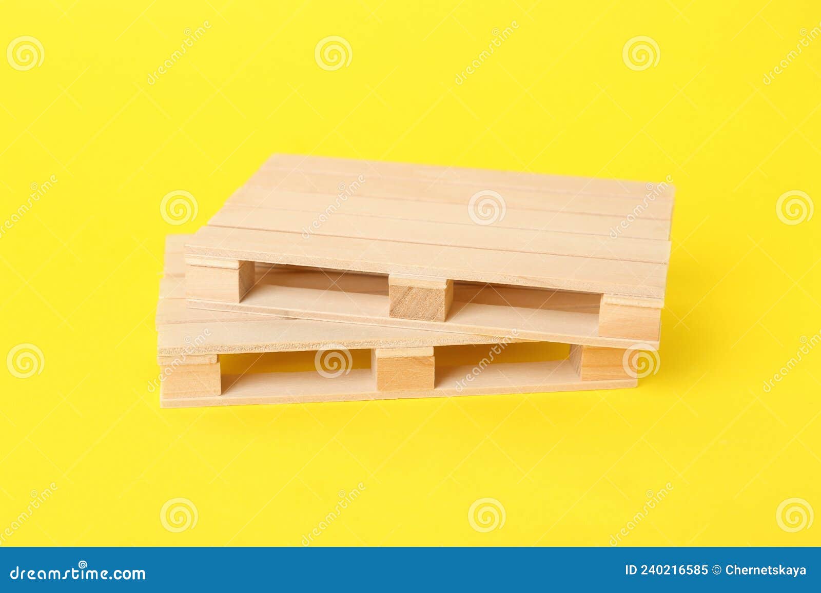 Two Small Wooden Pallets on Yellow Background Stock Image - Image of ...