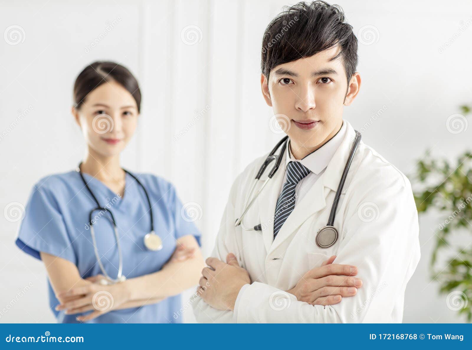 Two Smart and Professional Smiling Doctors Stock Photo - Image of ...