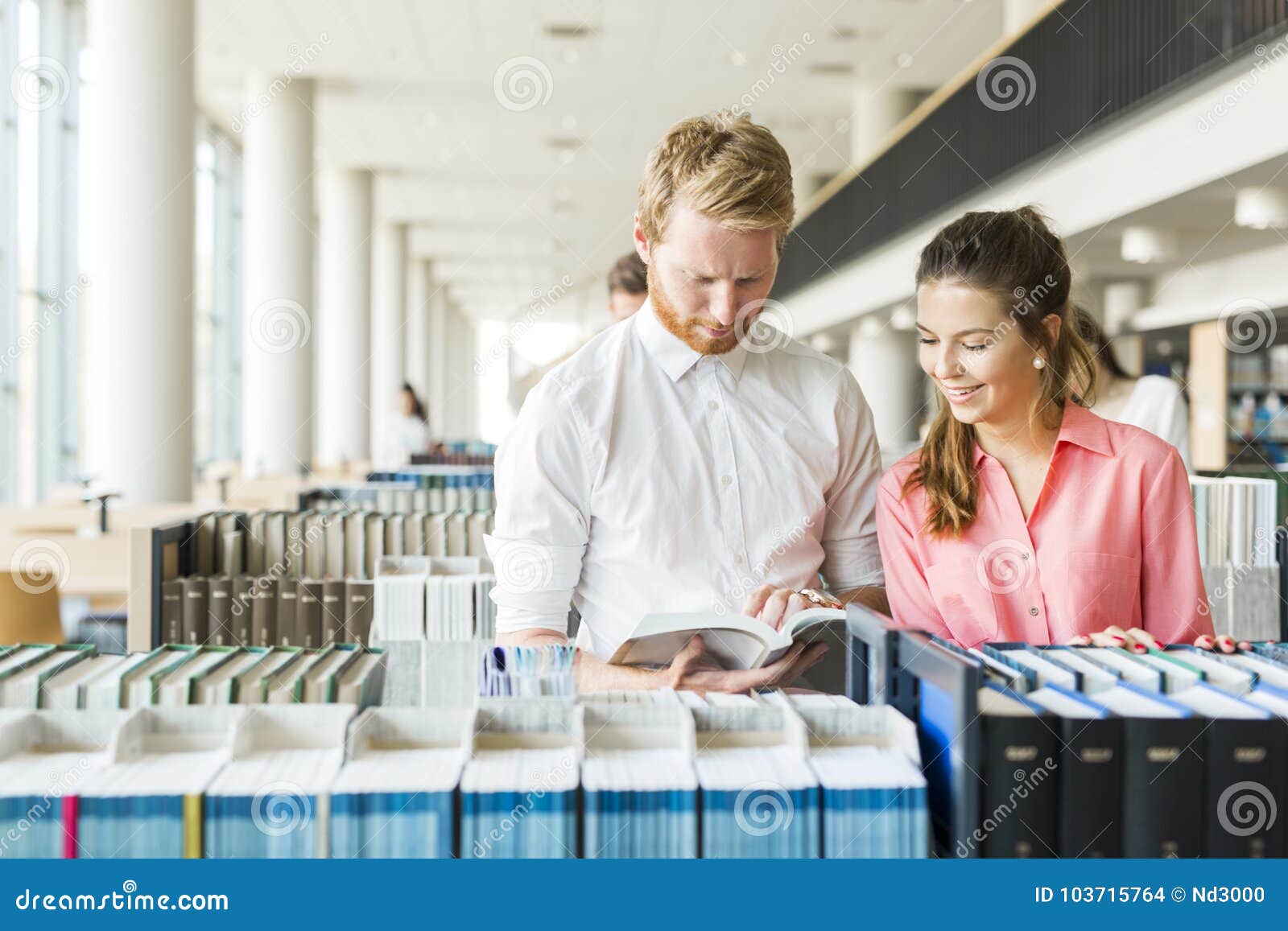Two Students Reading and Studying in Library Stock Photo - Image of ...