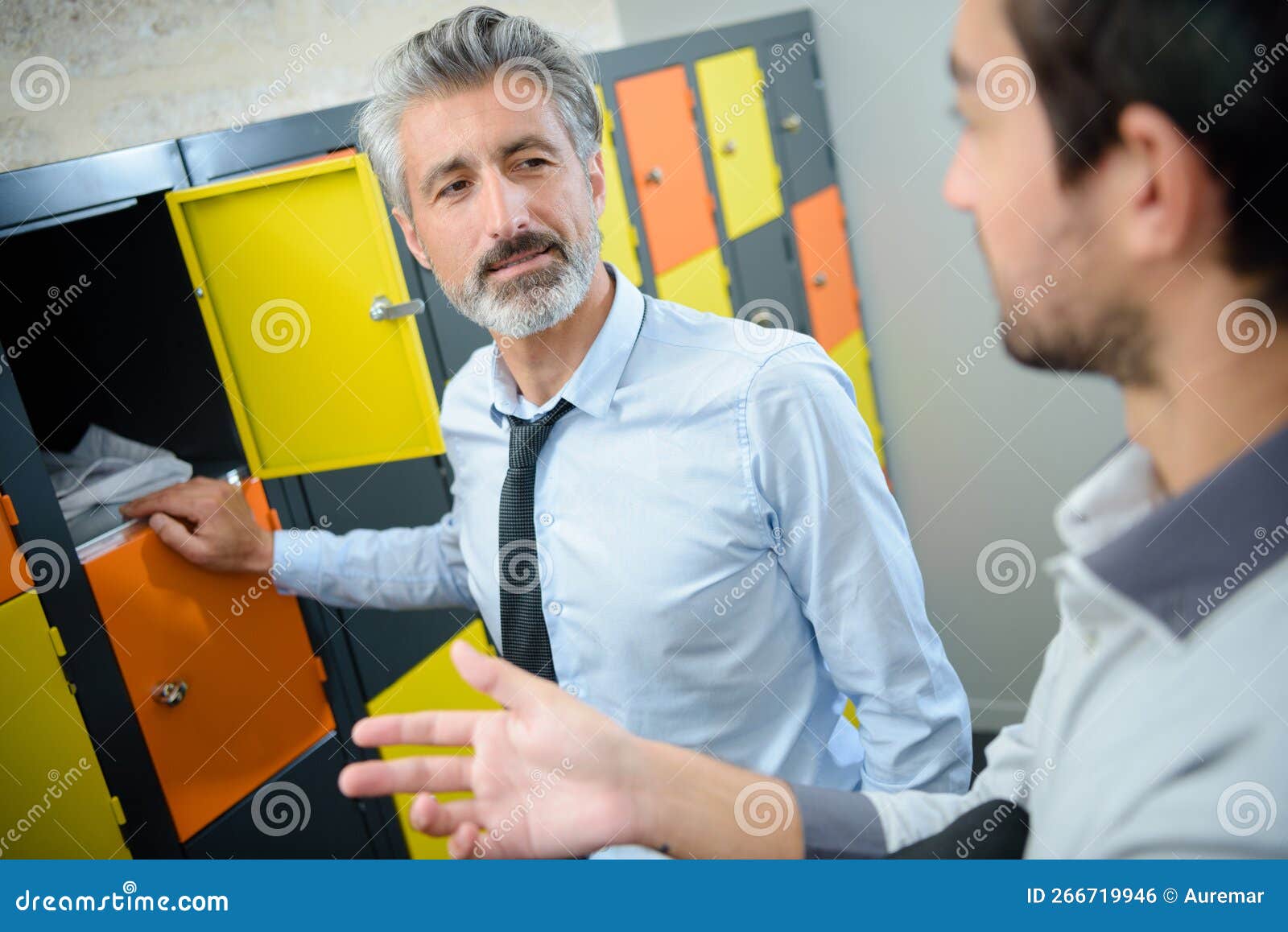 Two Smartly Dressed Men in Locker Room Stock Photo - Image of adult ...