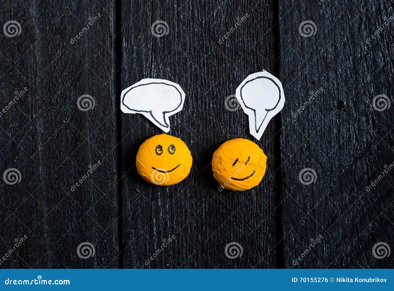 Two smile face talking. stock photo. Image of emoticon - 70155276