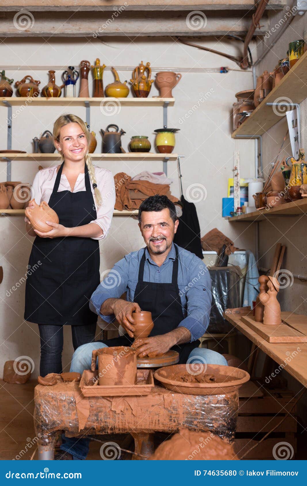 Two Smiling Artisans in Ceramics Workroom Stock Photo - Image of ...
