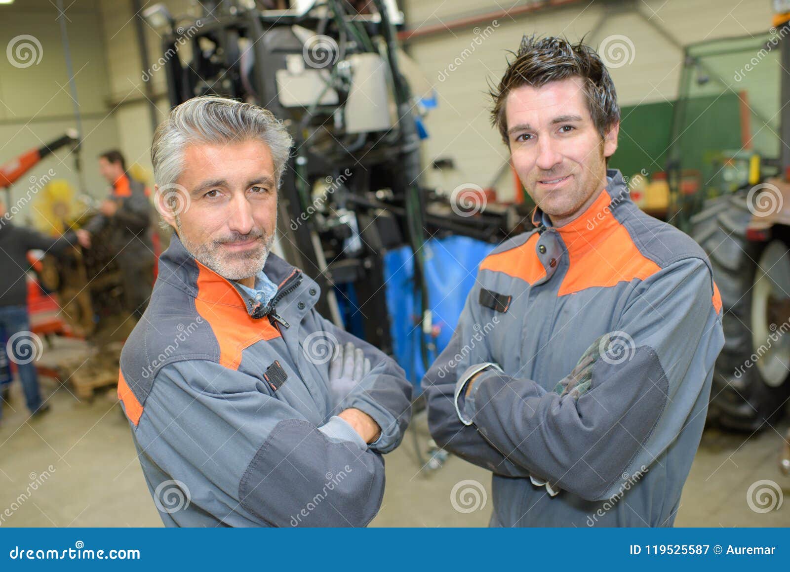 Two Smiling Auto Mechanic Workers Stock Image - Image of sandpaper ...