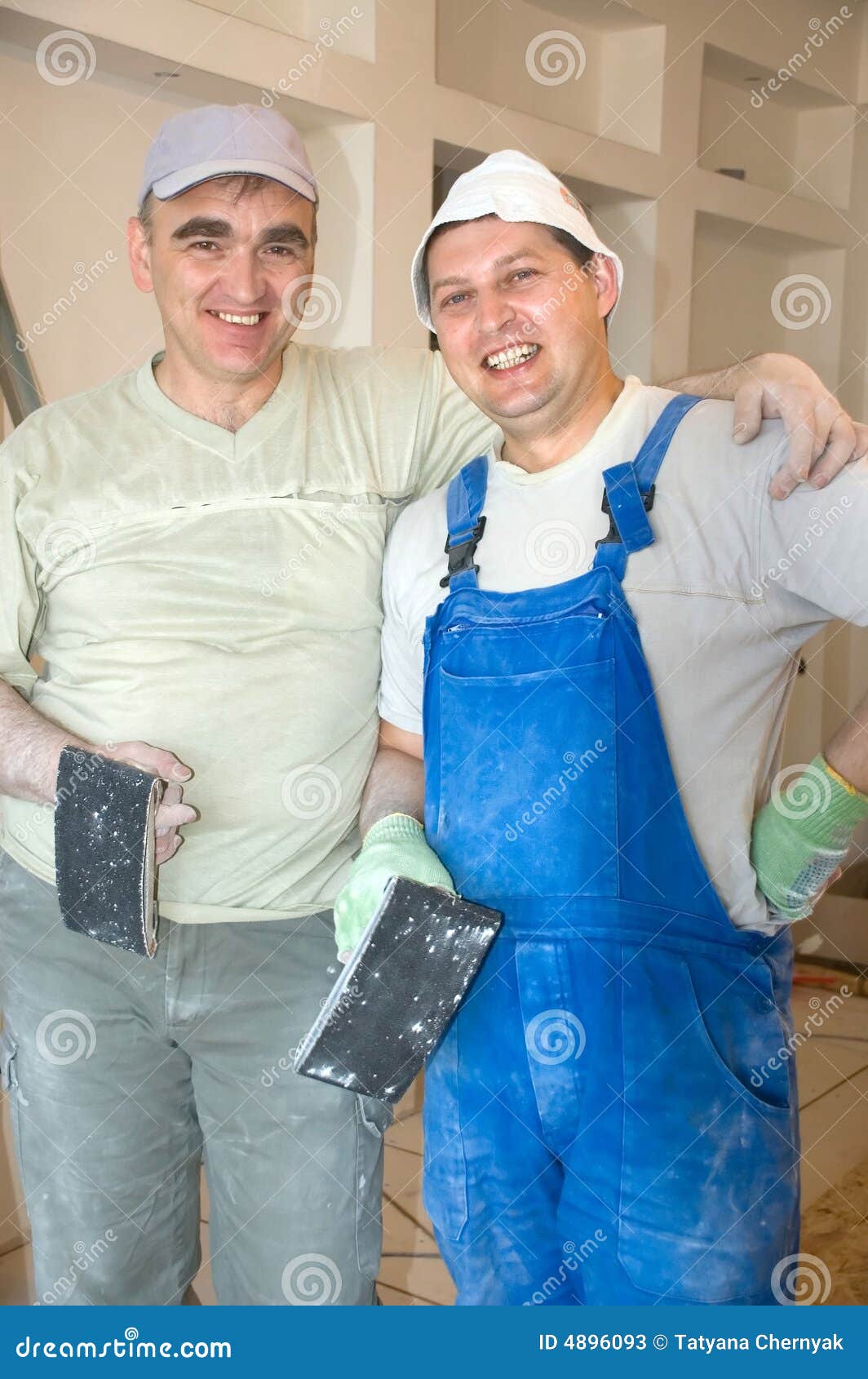 Two smiling builders stock image. Image of industry, constructer - 4896093