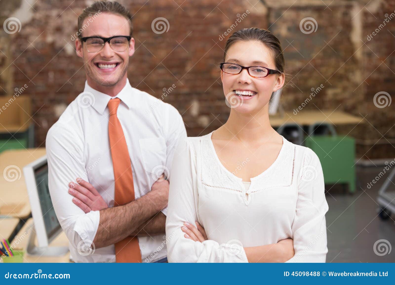 Two Smiling Business Colleagues in Office Stock Photo - Image of ...