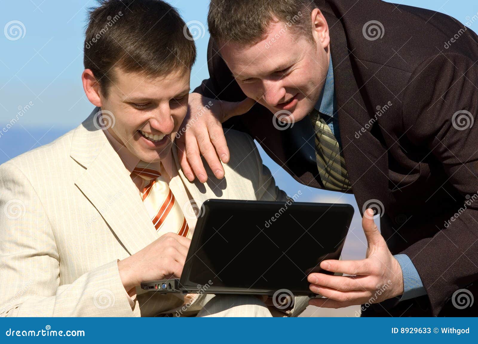 Two Smiling Businessmen with Laptop Stock Image - Image of notebook ...