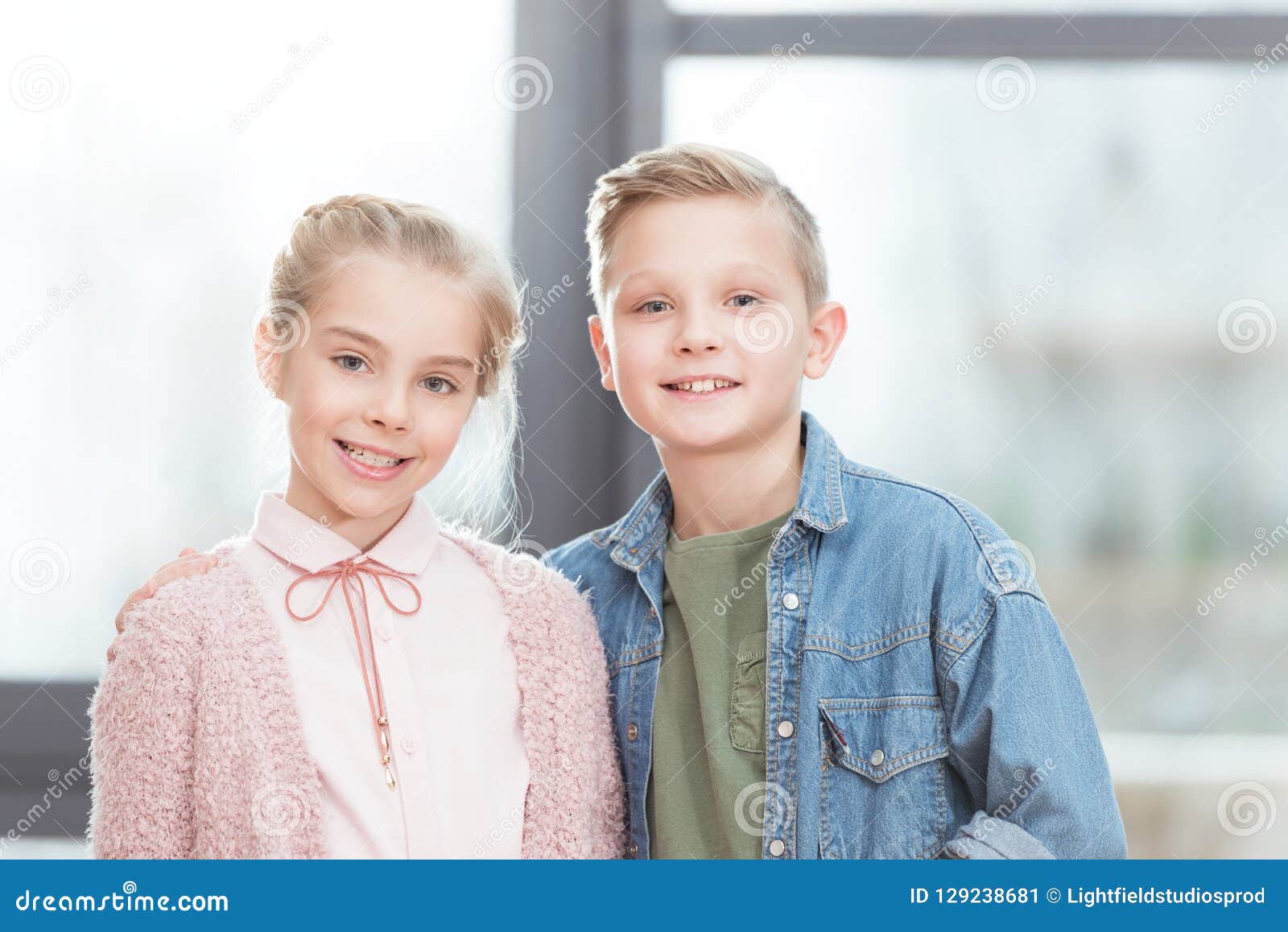 Two Smiling Caucasian Kids Looking Stock Image - Image of sister, store ...