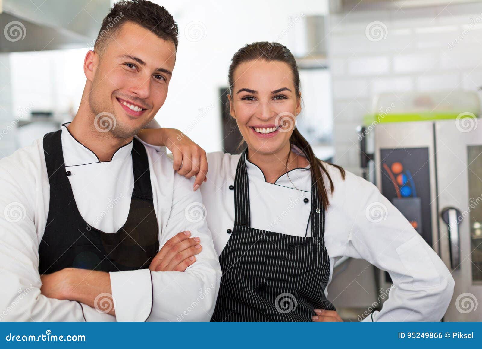 Two Smiling Chefs in Kitchen Stock Photo - Image of people, hotel: 95249866