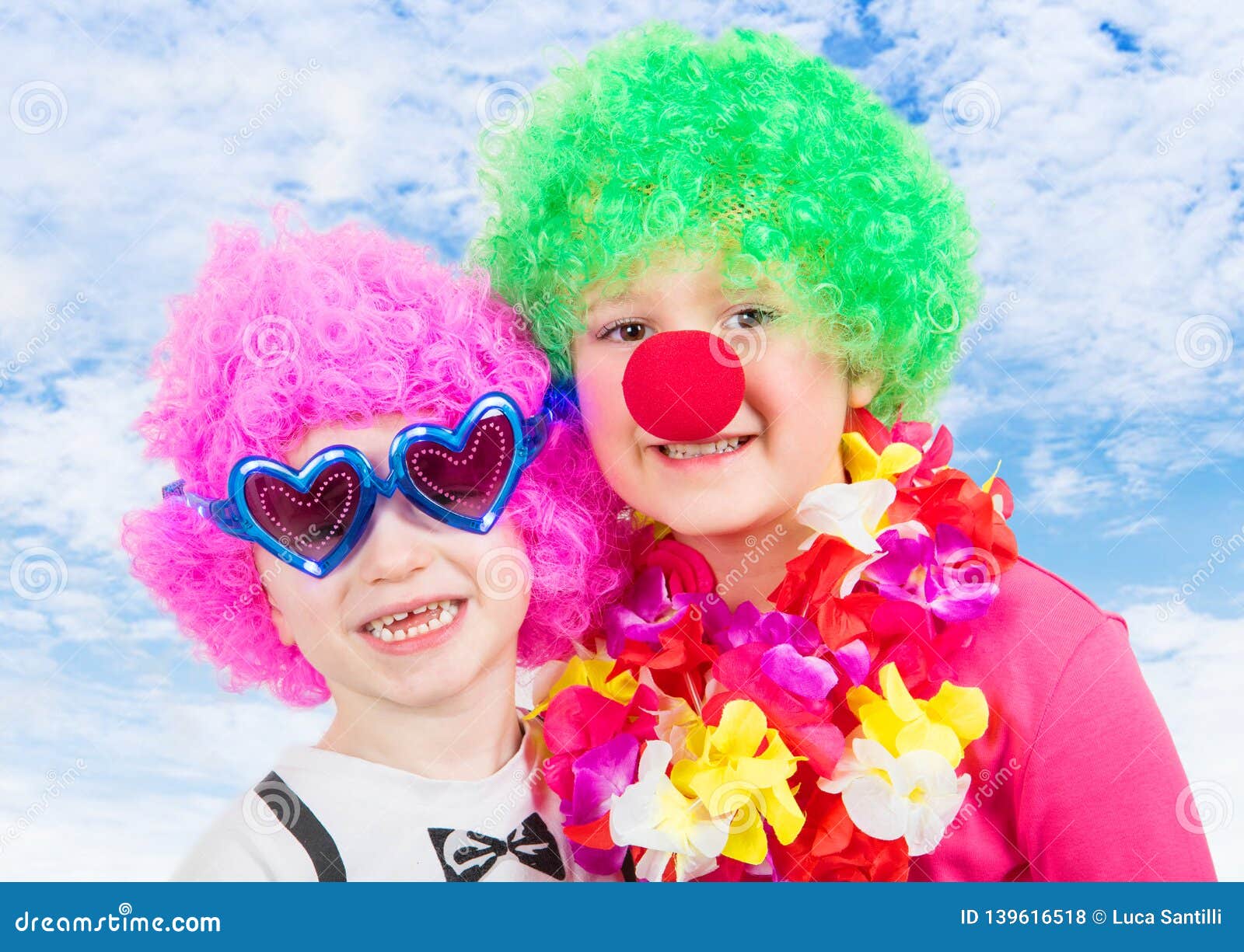 Two Smiling Child with Carnival Mask Stock Photo - Image of clouds ...