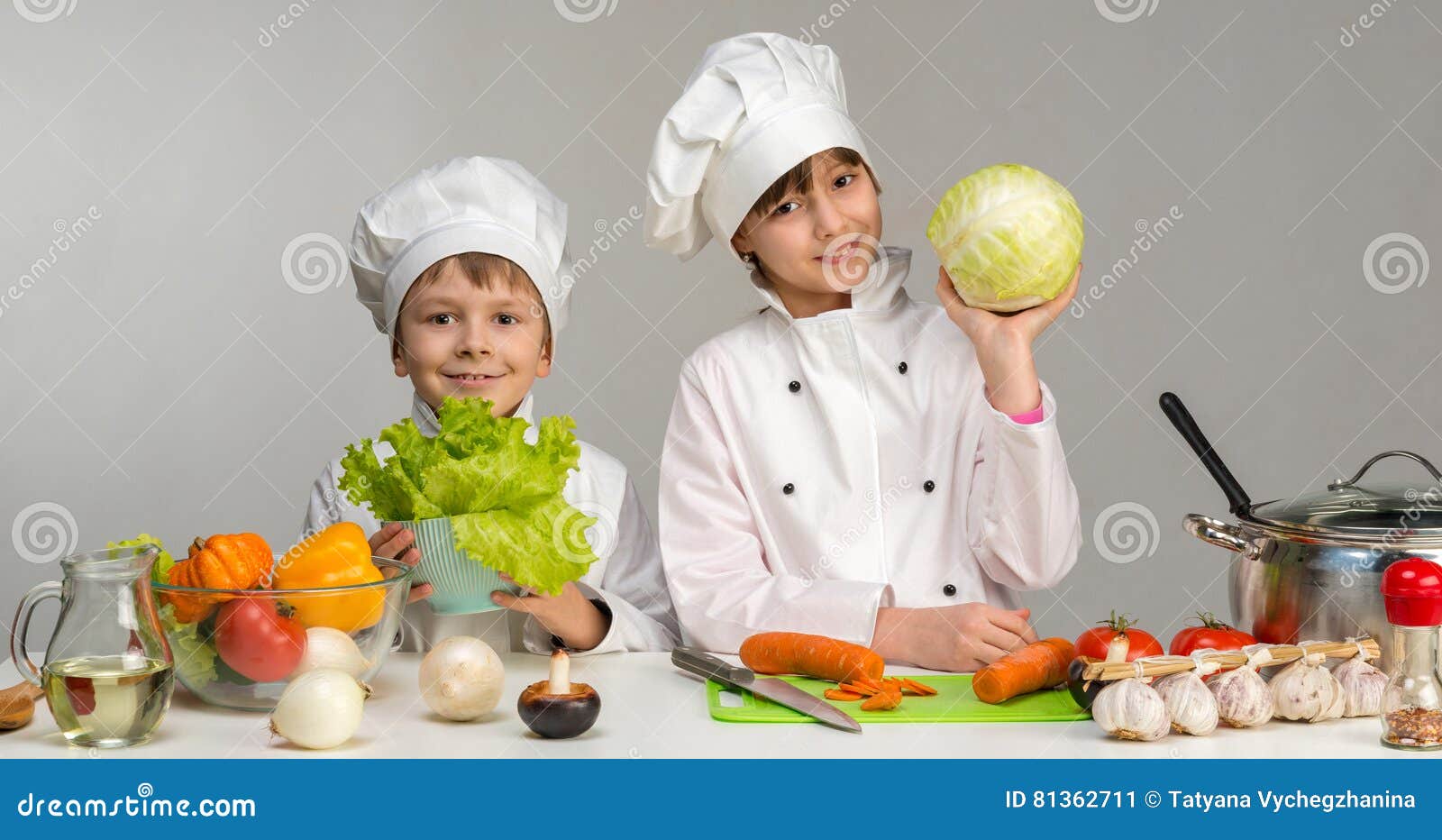 Two Smiling Children-cooks by the Table with Vegetables Stock Image ...